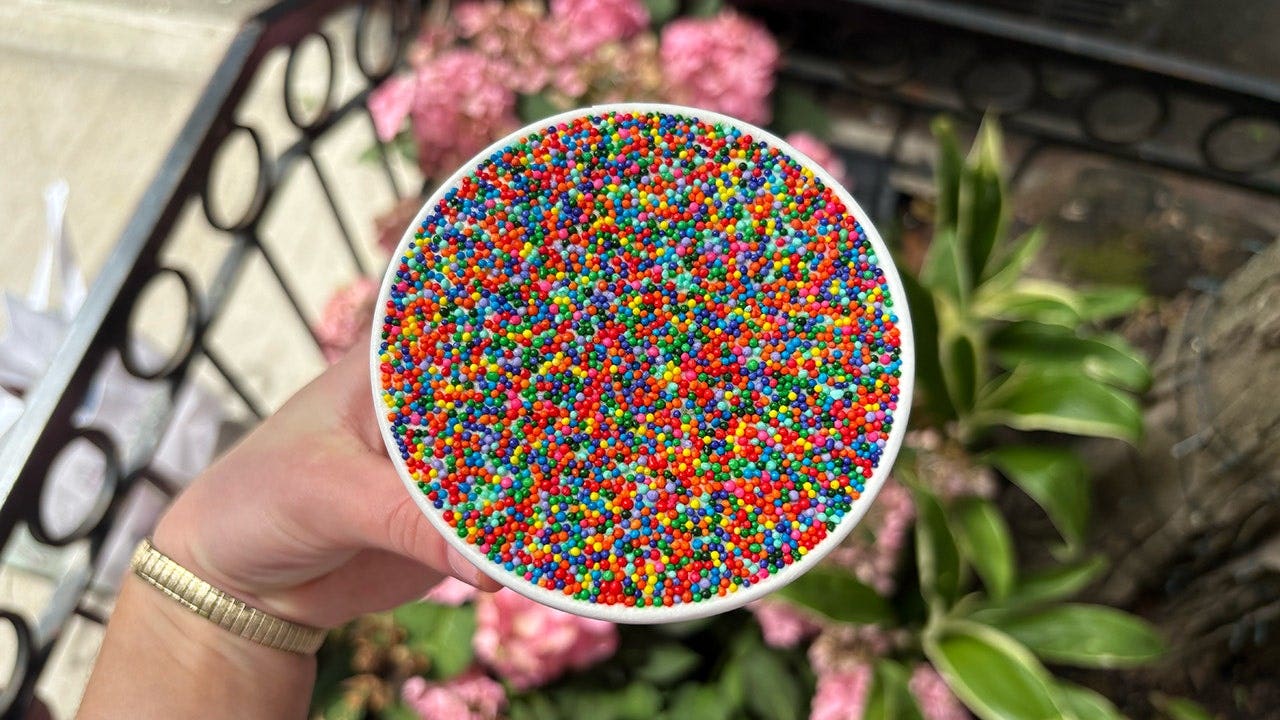 Lines wrap around block as customers wait hours for viral dot cakes ...