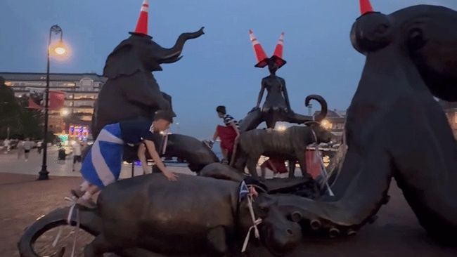 Scotland fans give Boston sculpture a makeover crowning figures with ...