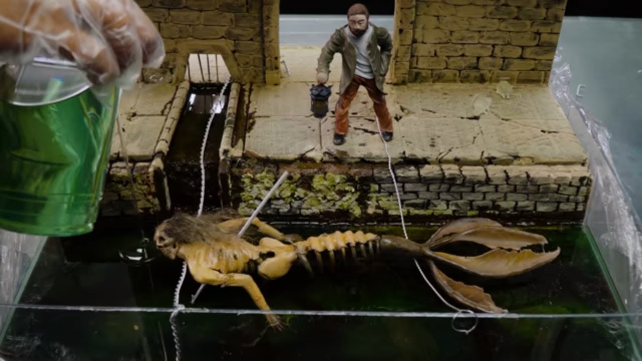 Crafting a dark mystery: Detailed mermaid & detective sewer diorama ...