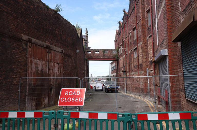'Urgent' road closures set up around collapsing building on edge of ...