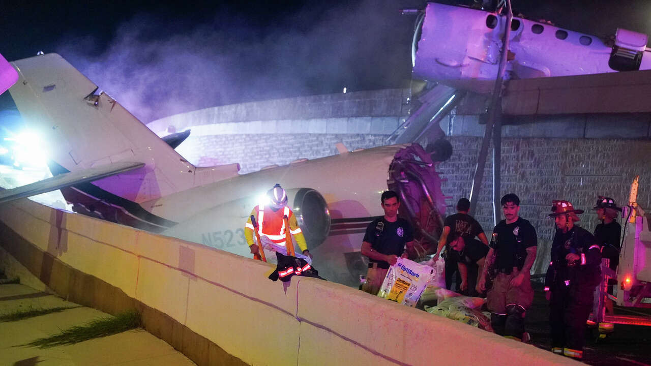 Photos & video: See the rescue and the aftermath of Tuesday's plane crash