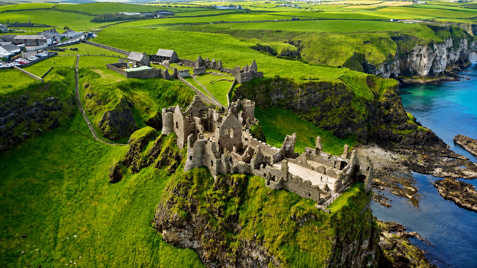 Dunluce Castle ruins clinging to Northern Ireland’s coastal cliffs