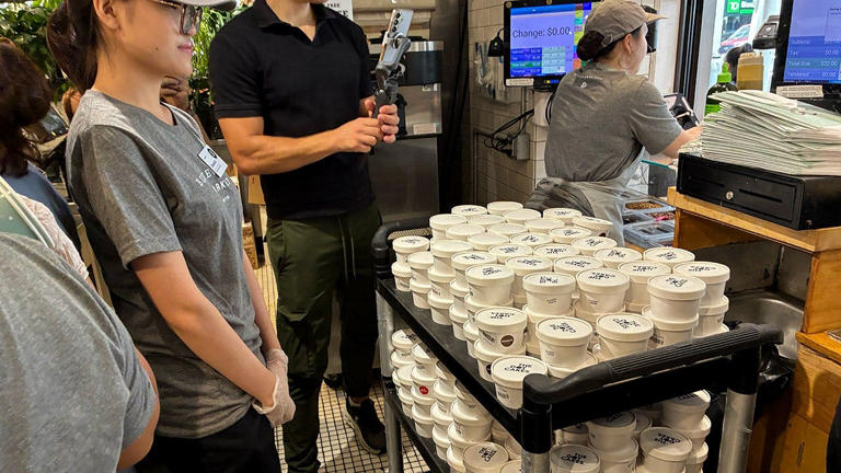 Lines wrap around block as customers wait hours for viral dot cakes ...