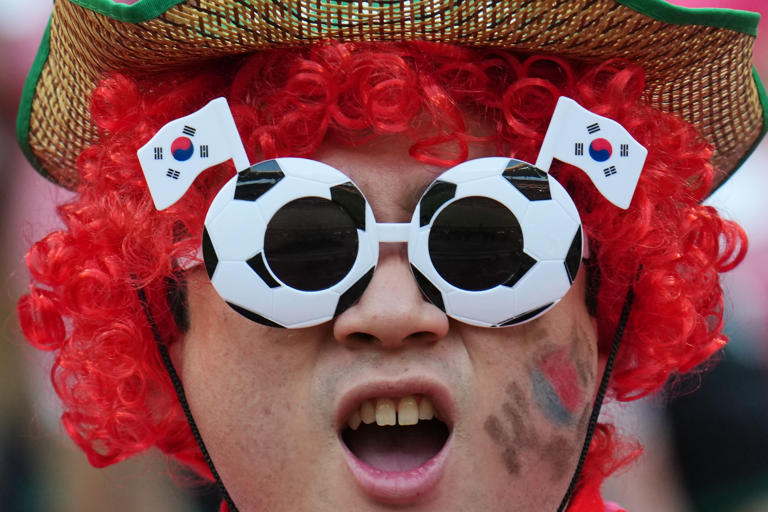 World Cup fans flood stadiums and fan zones with dazzling costumes ...