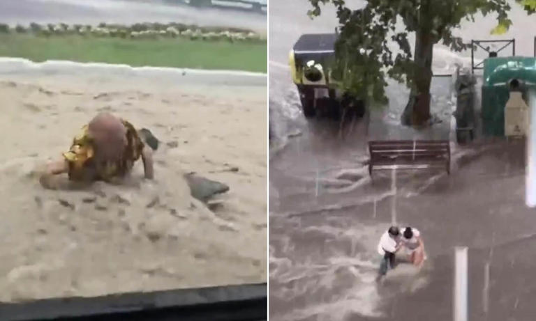 Incredible floods hit southern Spain with pedestrians swept along ...