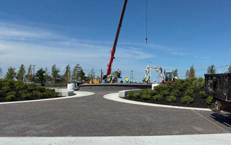 Bills fans catch glimpse of first bison statue going up outside new ...