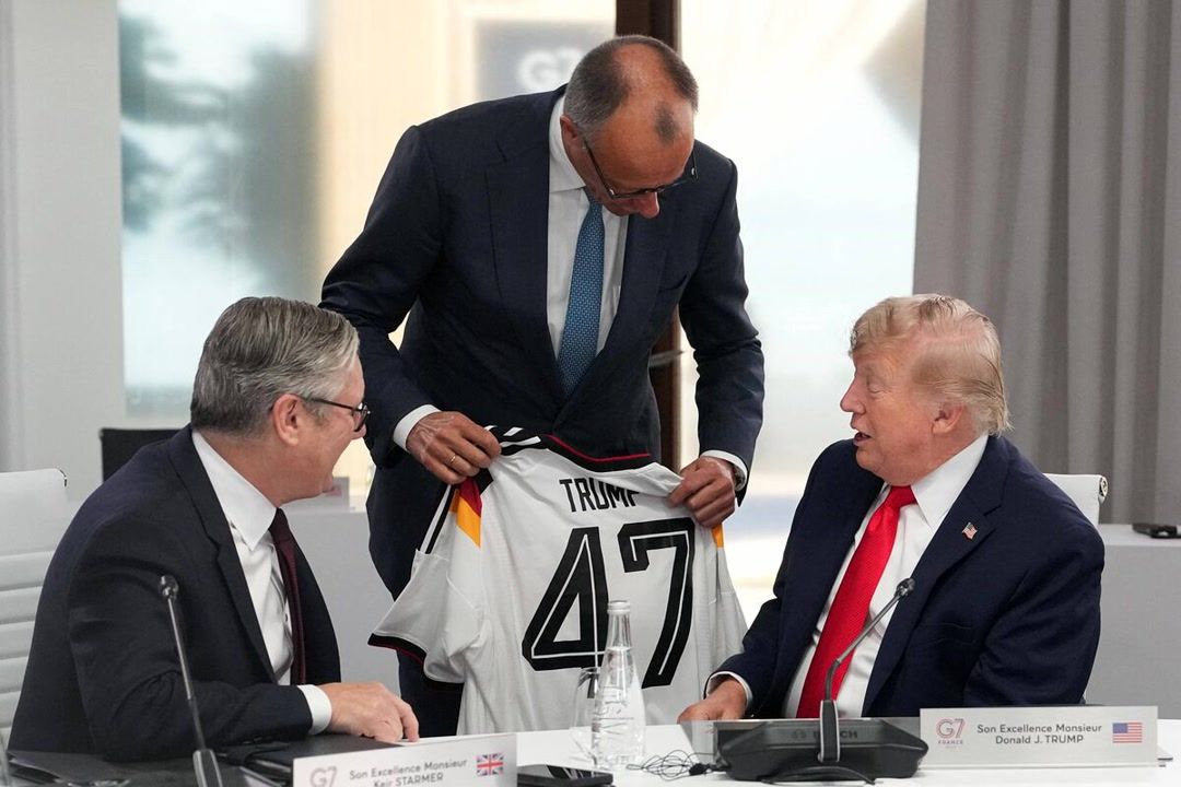 Trump message to German chancellor deciphered by lip reader after ...