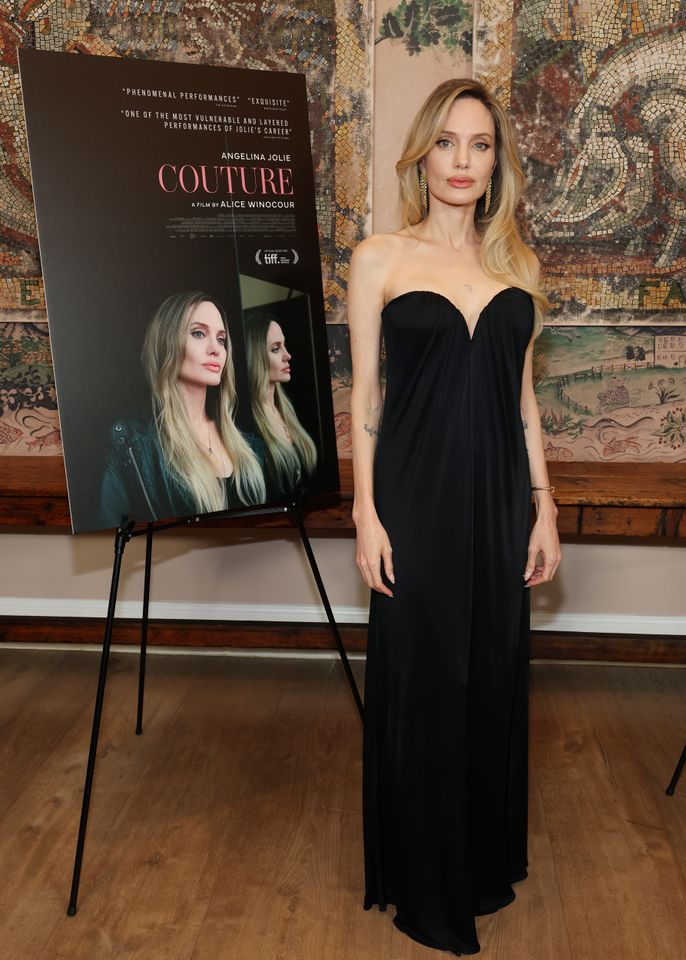 Angelina Jolie brings old-Hollywood energy in plunging LBD and ...