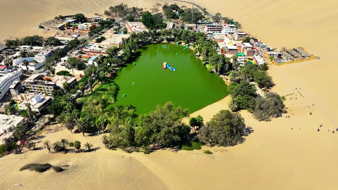 Huacachina, Peru: Drone flies over desert oasis