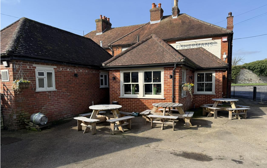 Historic village pub opposite ruins of a 13th-century abbey could ...