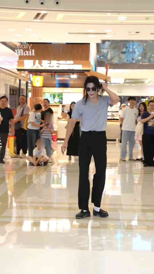 Michael Jackson impersonator accepts moonwalk challenge