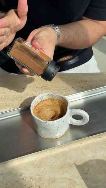 A cozy dalgona coffee with cinnamon flavor