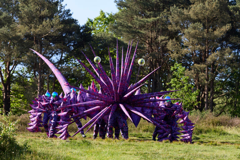 First look at giant creature puppet as iconic Sussex forest marks 100 ...