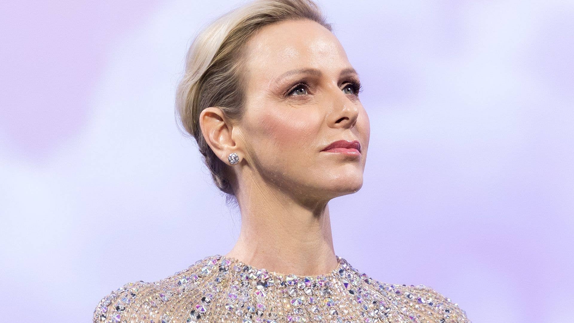 Princess Charlene sparkles in cascading crystals as she copies Princess ...