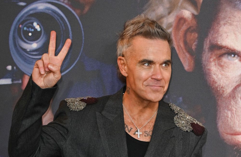 Robbie Williams unterschreibt bei Management-Team einer ikonischen 90er ...