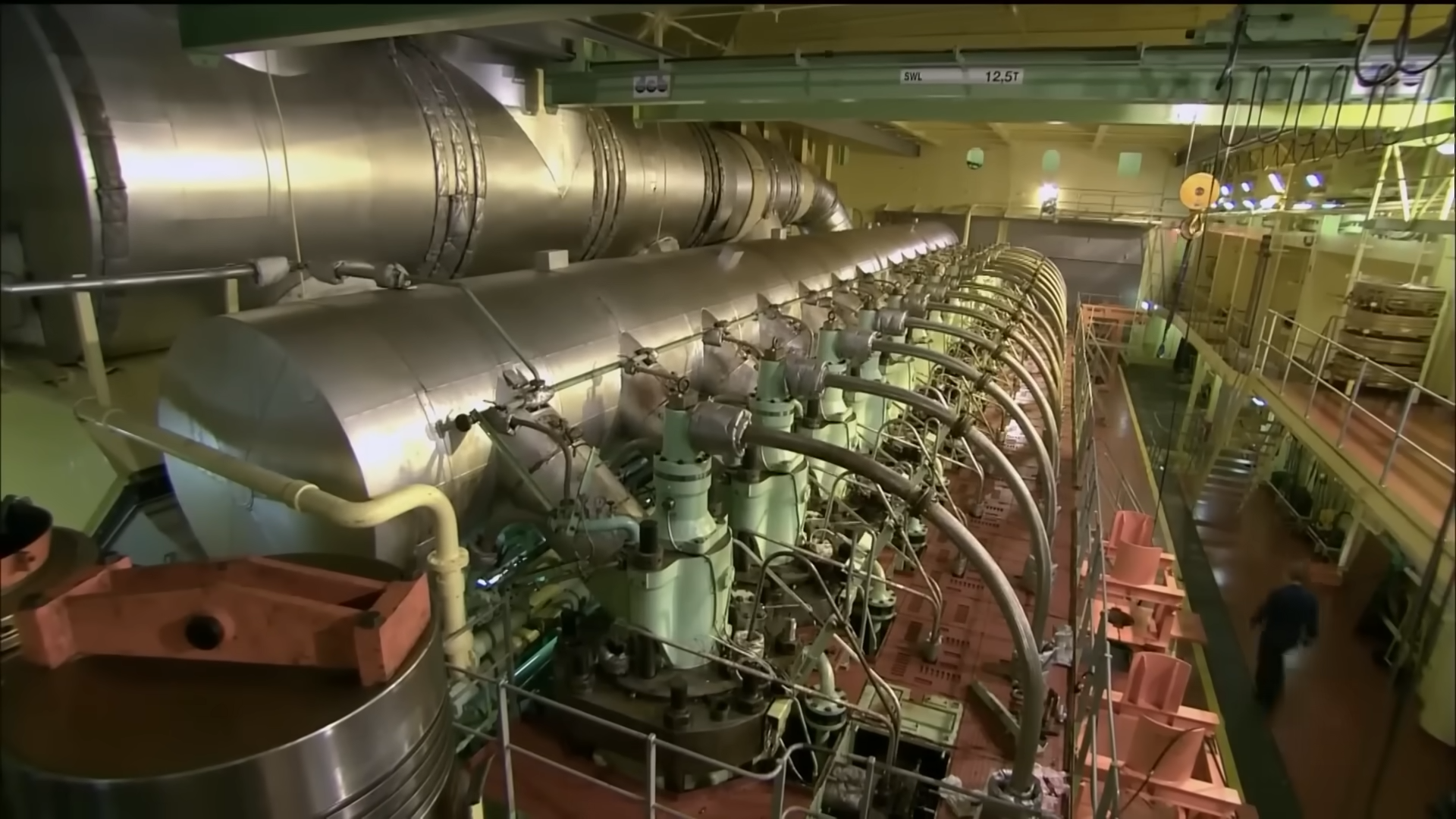 This engine is 13 stories tall - and it turns slower than a clock