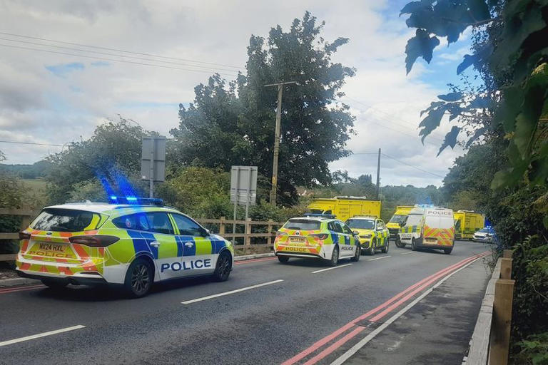 Woman rushed to hospital from Manchester Ship Canal