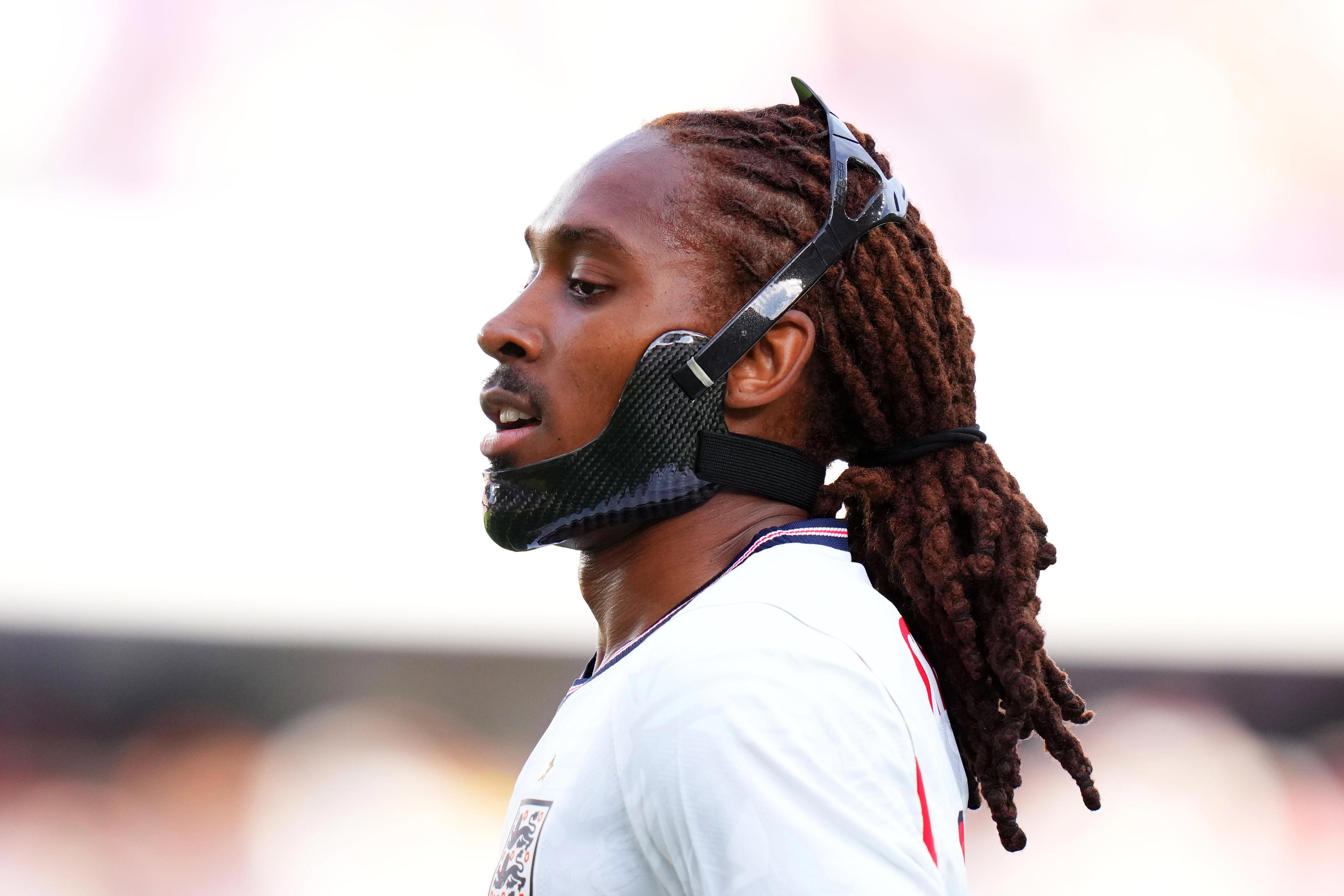 Why does England's Djed Spence wear a face mask at the World Cup?