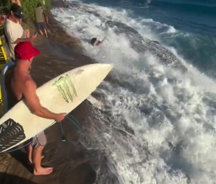 Rogue wave sweeps woman off infamous beach as frantic rescue caught on ...