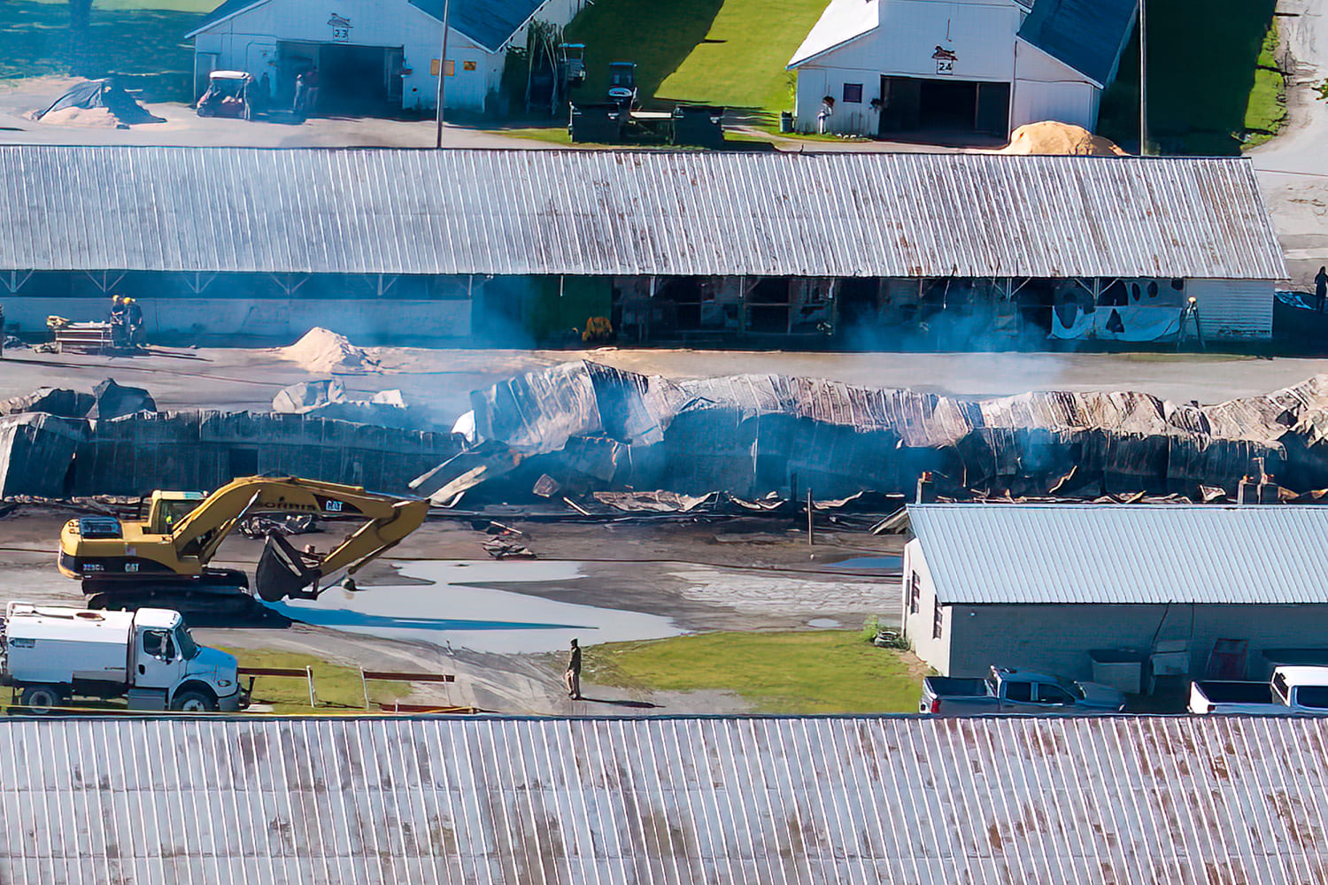 A barn fire at harness racing track kills 17 horses in upstate New York ...