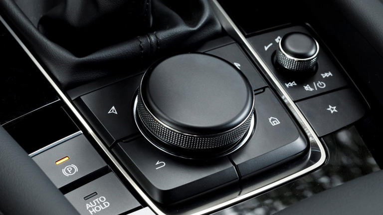 Mazda spent years arguing against touchscreens, now claims they’re ...