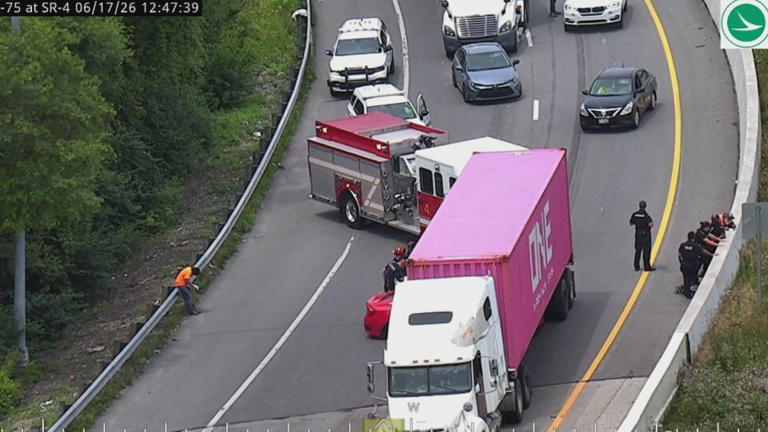Car reportedly crushed under semi on I-75 ramp