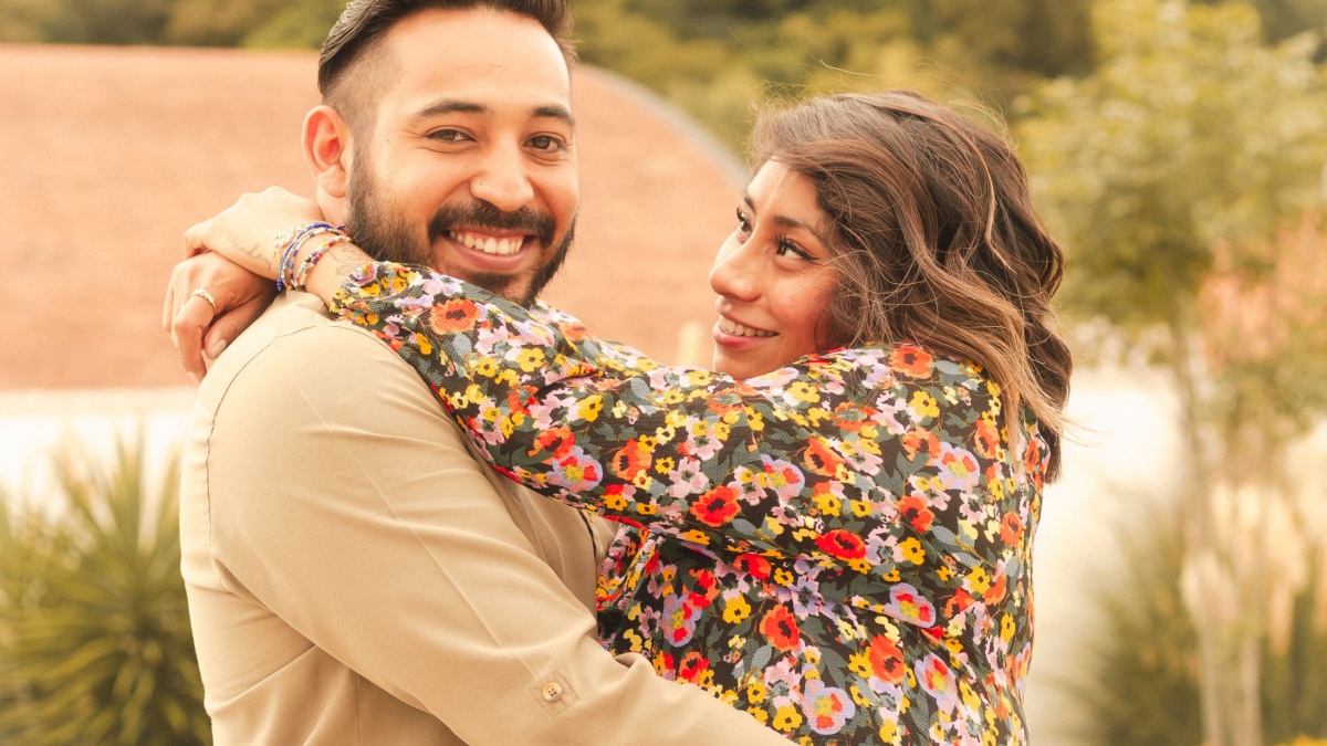 A happy wife, walking arm in arm with her husband, shows these 13 ...