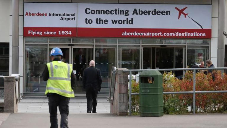 Aberdeen airport security staff back strike action in pay row
