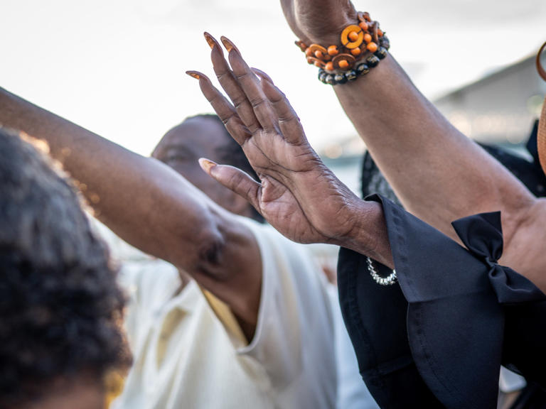 Prayer takes over protests at Delaney Hall. 'God will intervene.'