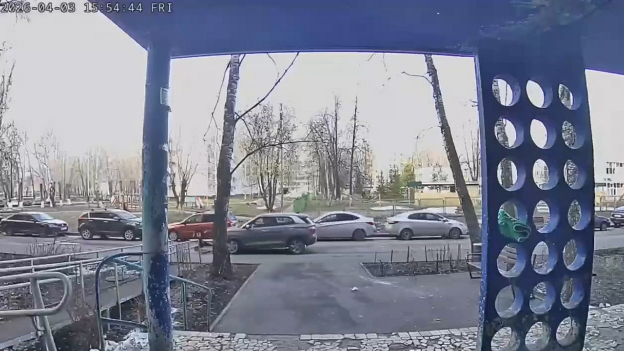 Scooter boy nearly hit by car in Russian park