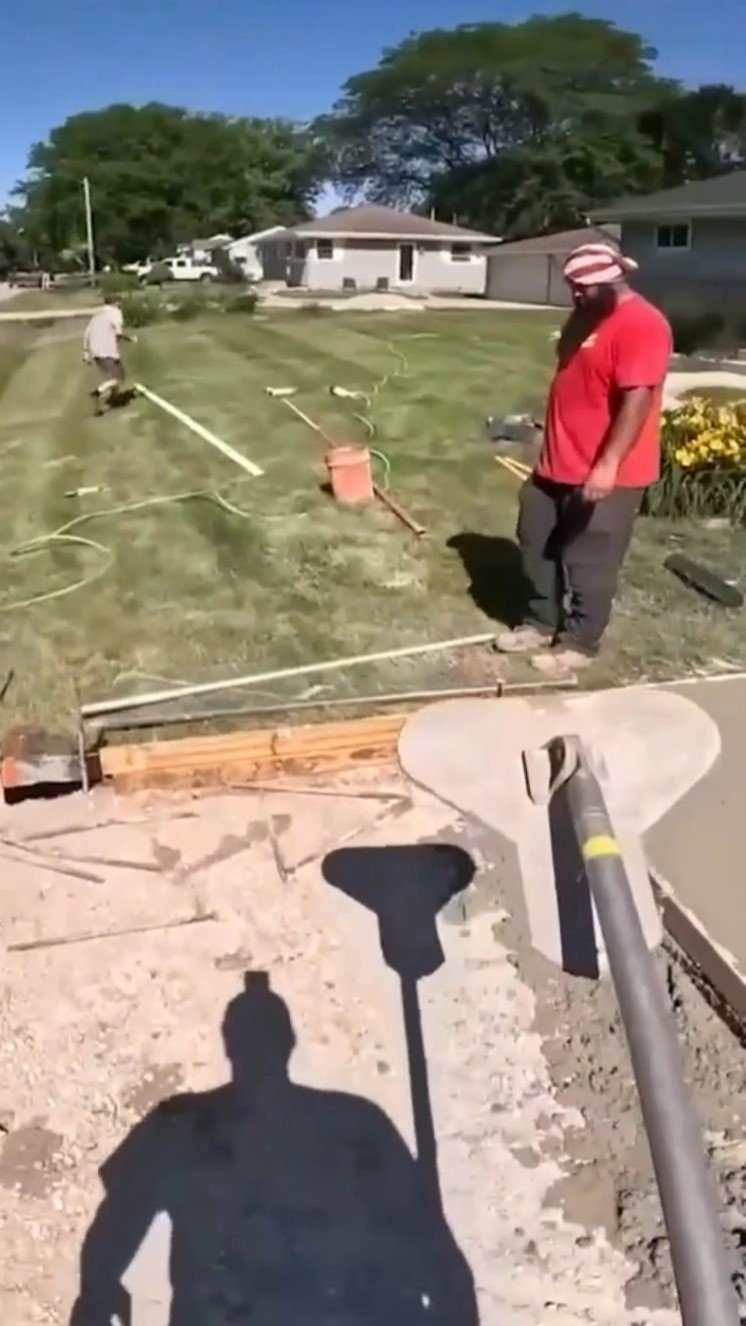 Expert broom finish on fresh concrete