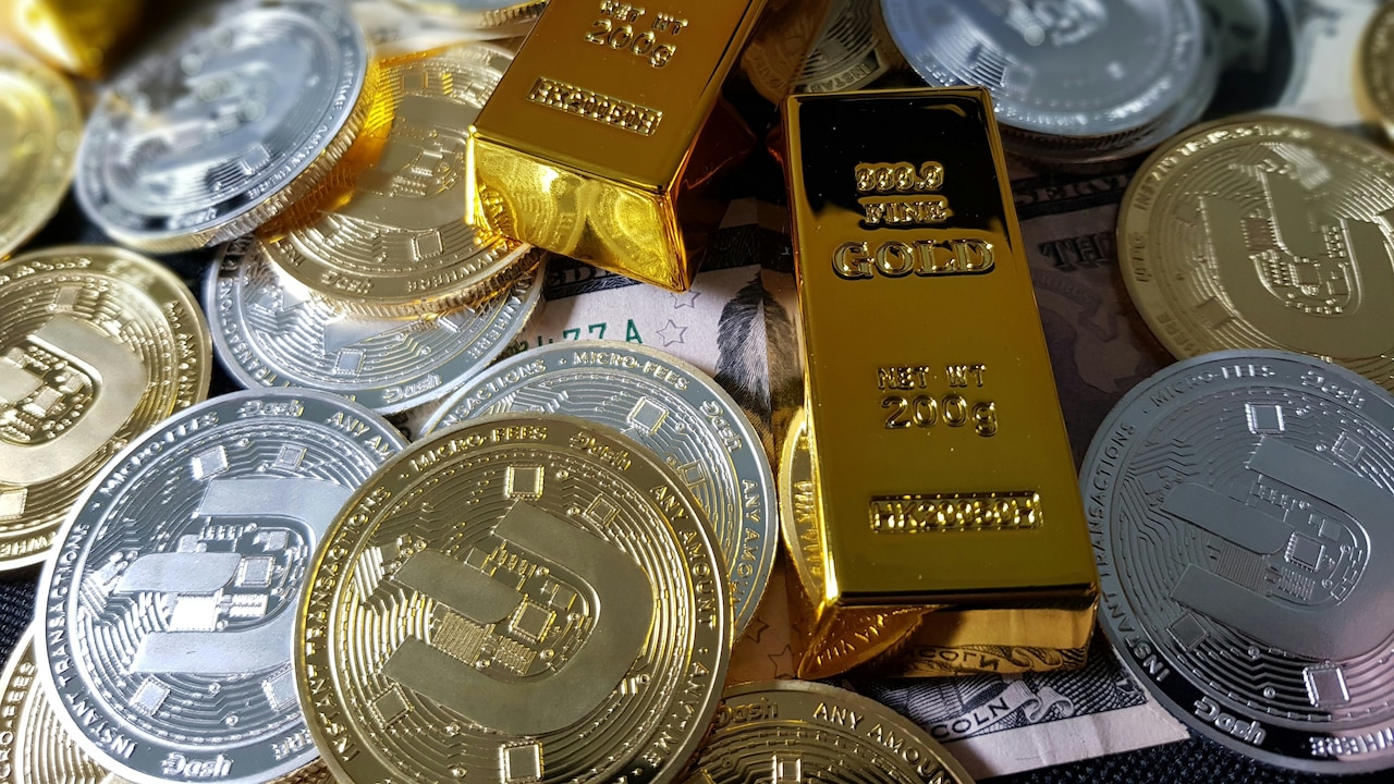 Gold falls over 2%, silver slumps to $66 as Fed dot plot hints at rate ...