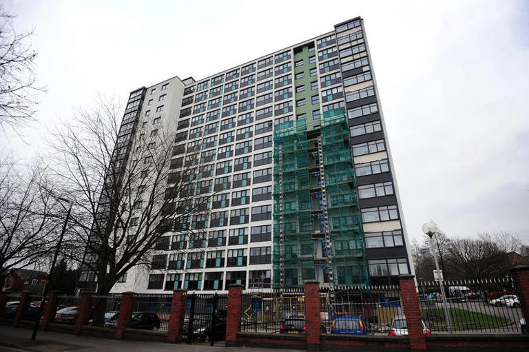 Police update as man fights his life in hospital after Salford tower ...