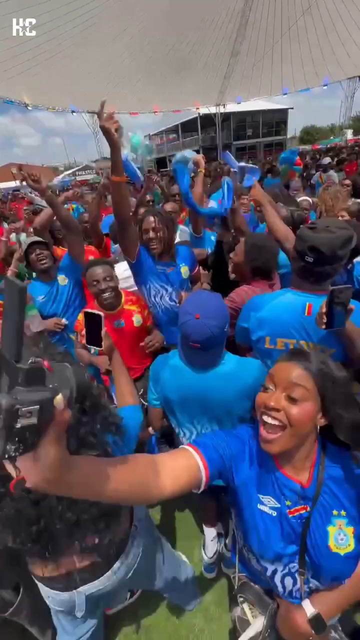 DR Congo fans celebrate a 1-1 tie against Portugal in their first World ...