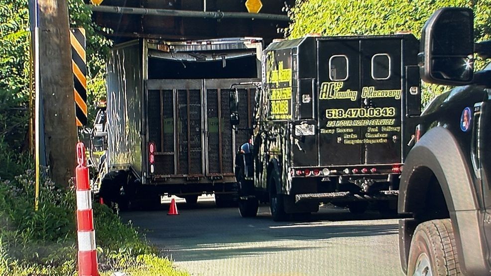 Driver, following GPS, crashes 12 foot truck into 10 foot high ...