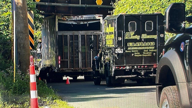 Driver, following GPS, crashes 12 foot truck into 10 foot high ...