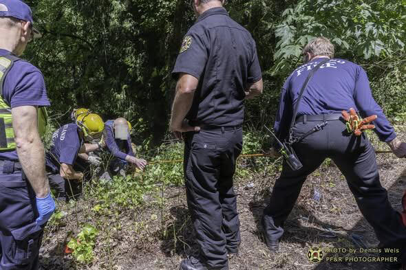 Fire crews rescue driver after rollover crash in SW Portland