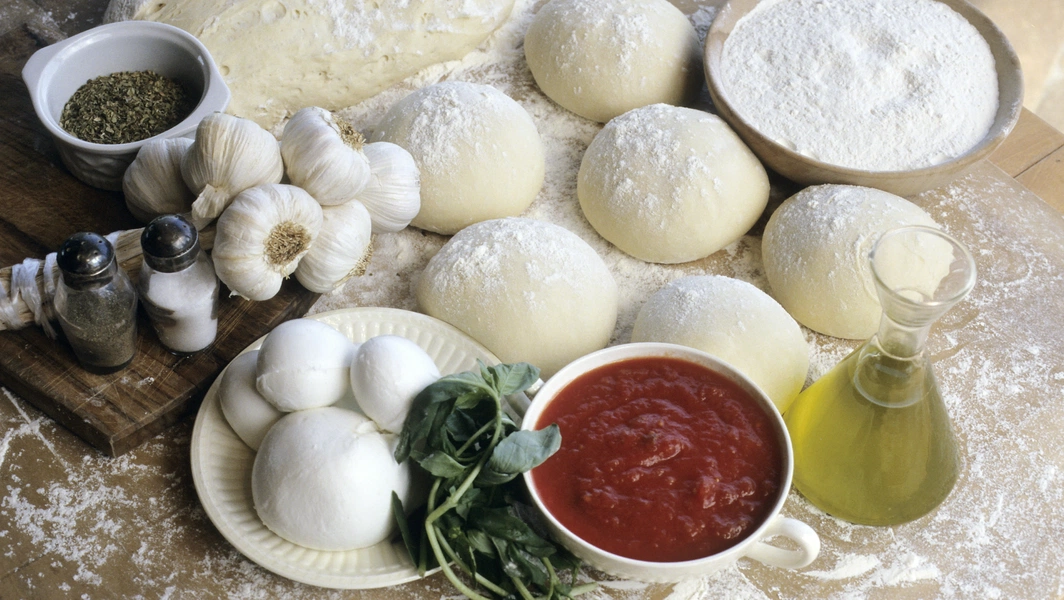 Enhancing pizza crust flavor and texture