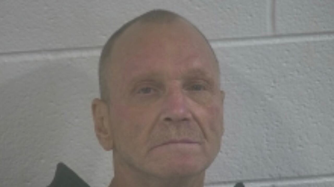 Man charged with murder; accused of setting home on fire with woman inside
