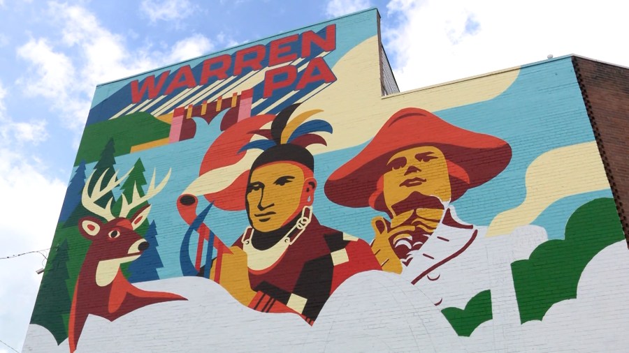 Local artist paints mural in Warren
