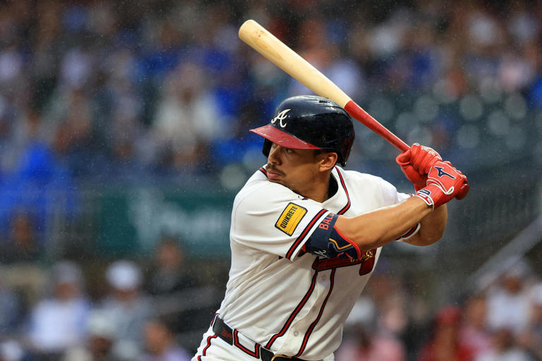 Braves get hit hard in both rain and shine in lifeless loss to Giants