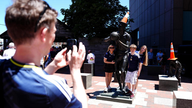 Mischievous Scotland fans give Boston's statues traffic cone hats