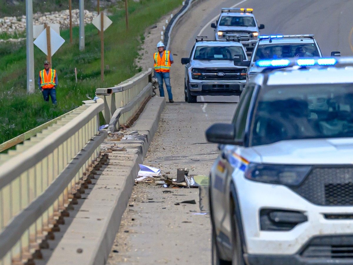 Worker killed after 300-ton crane crashes off bridge into Northern ...