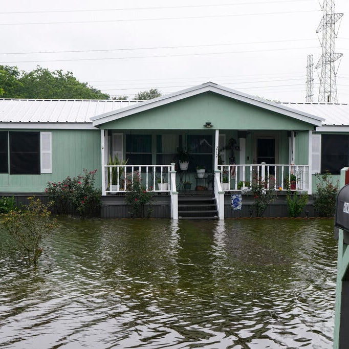 Tropical Storm Arthur weakens but still poses flash flooding threat