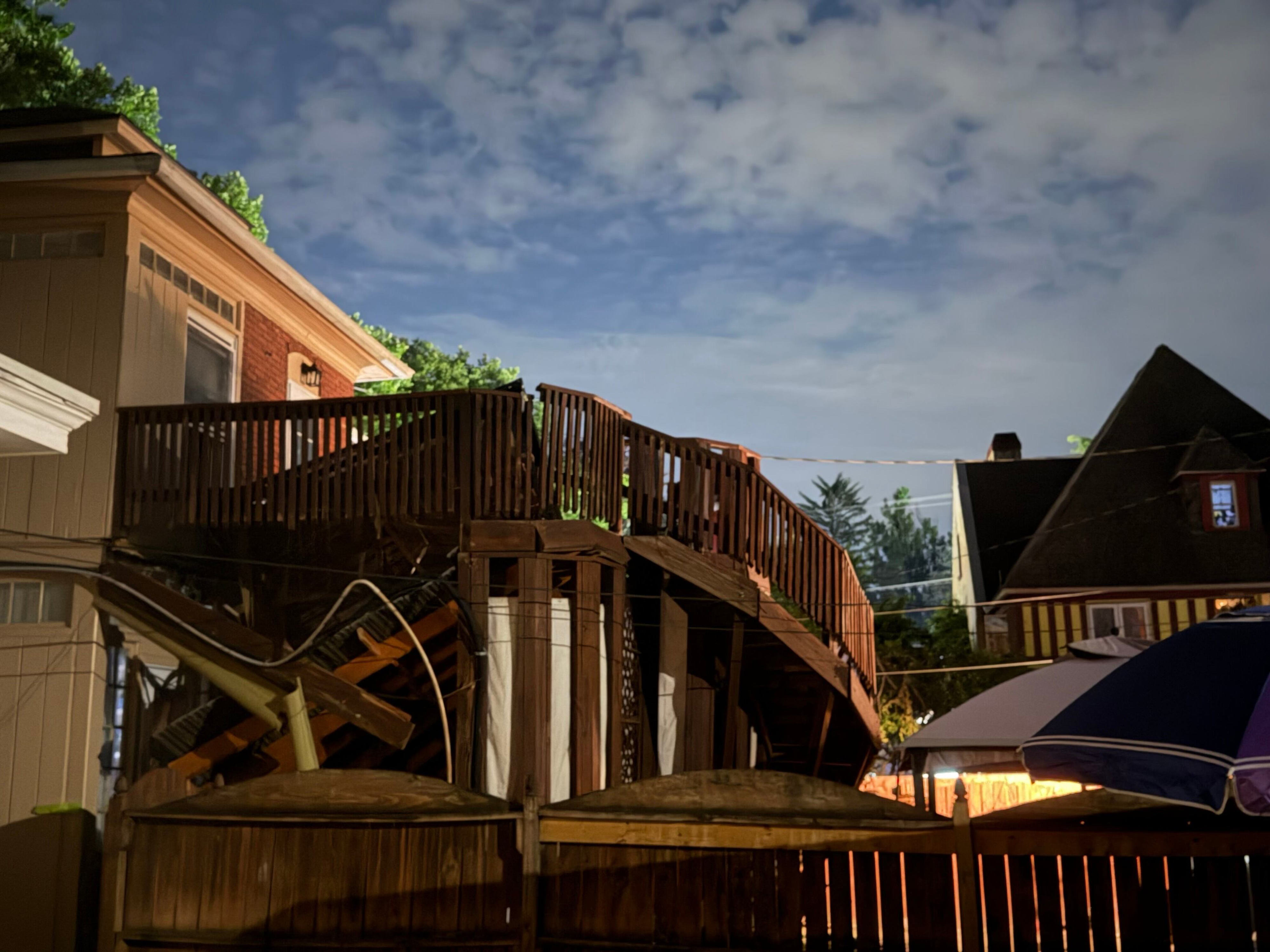 Man hospitalized after being trapped in Harrisburg porch collapse