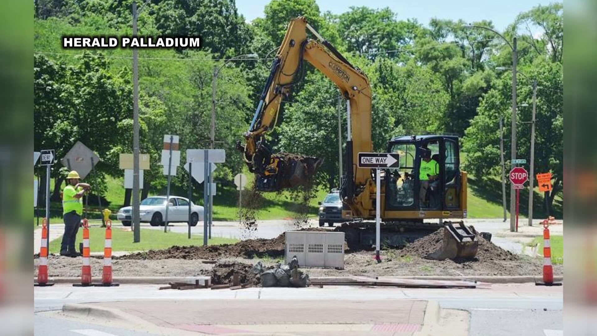 Crews work on curb maintenance for two roundabouts in Benton Harbor