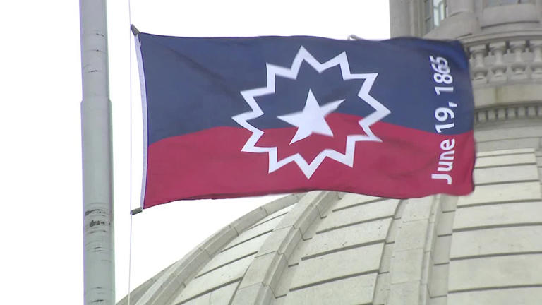 Wisconsin Juneteenth flag raised; paid holiday debate continues