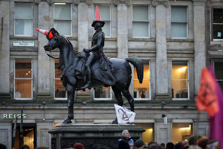 Mischievous Scotland fans give Boston's statues traffic cone hats
