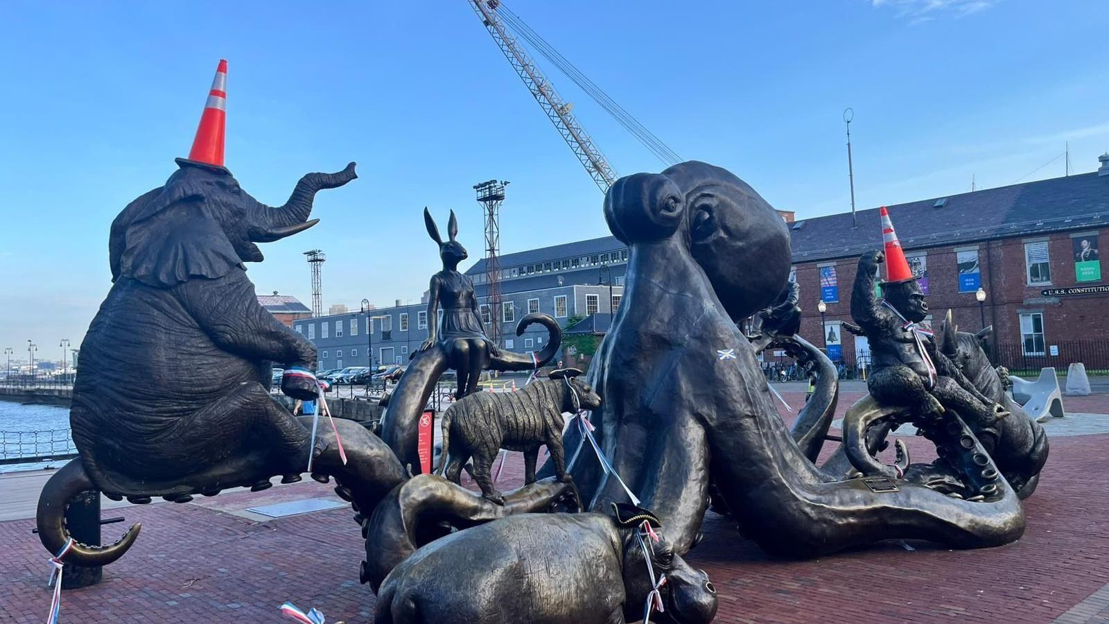 Mischievous Scotland fans give Boston's statues traffic cone hats