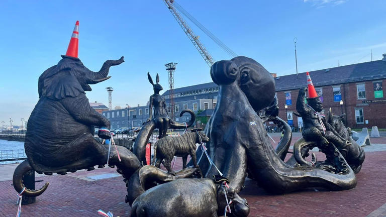 Mischievous Scotland fans give Boston's statues traffic cone hats
